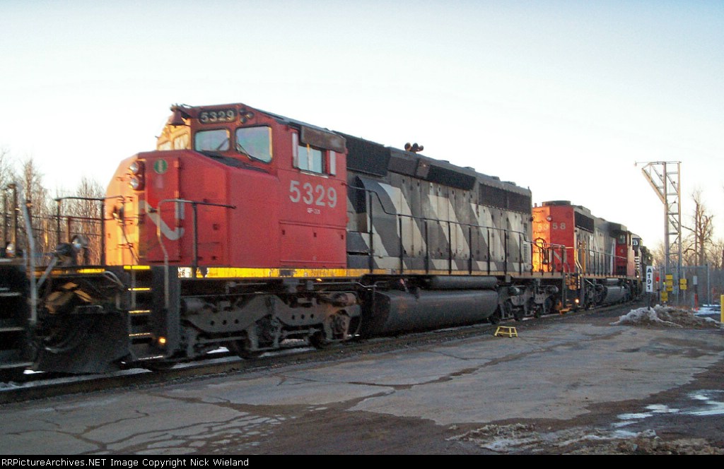 CN 5329 rolls past the station
